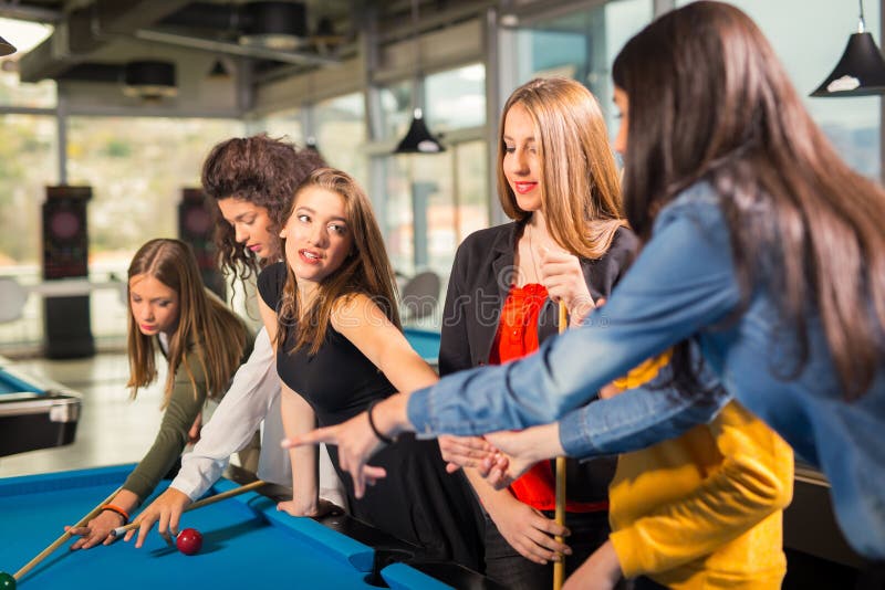 Group of Friends Playing Pool Together. Stock Photo - Image of ...