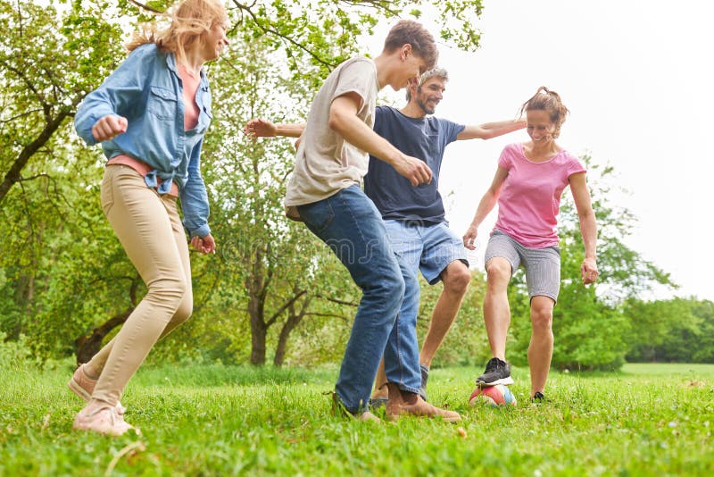 Group of Friends Playing Soccer in Summer Stock Image - Image of ...