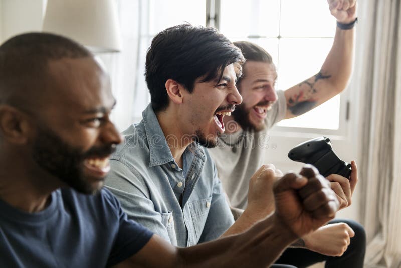 Group of Friends Playing Video Games Stock Photo - Image of condo ...