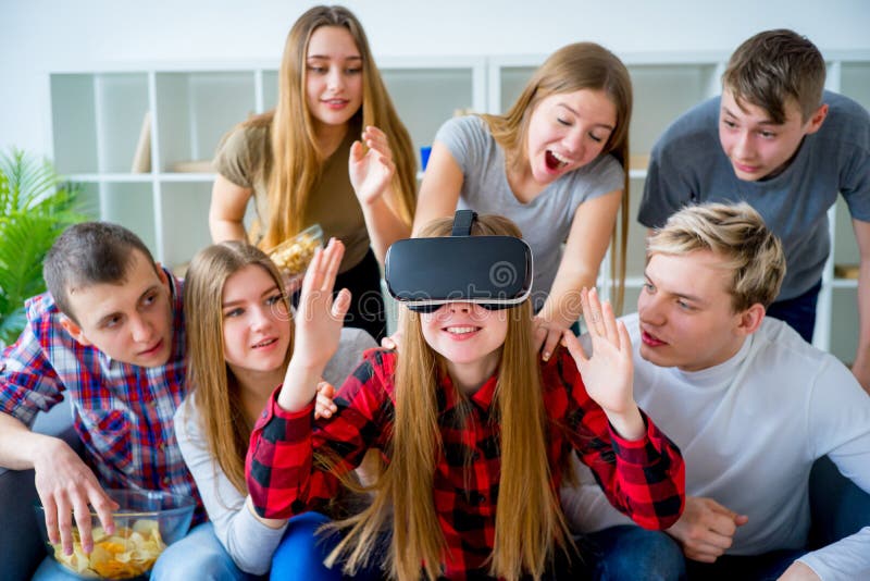 Group of Friends Playing with VR Stock Photo - Image of people, sitting ...