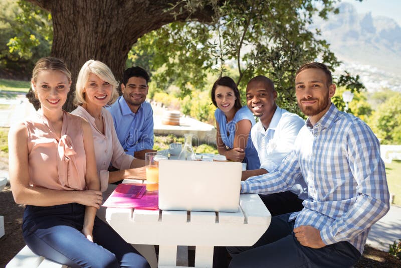 Group of Friends Sitting Together in Restaurant Stock Image - Image of ...
