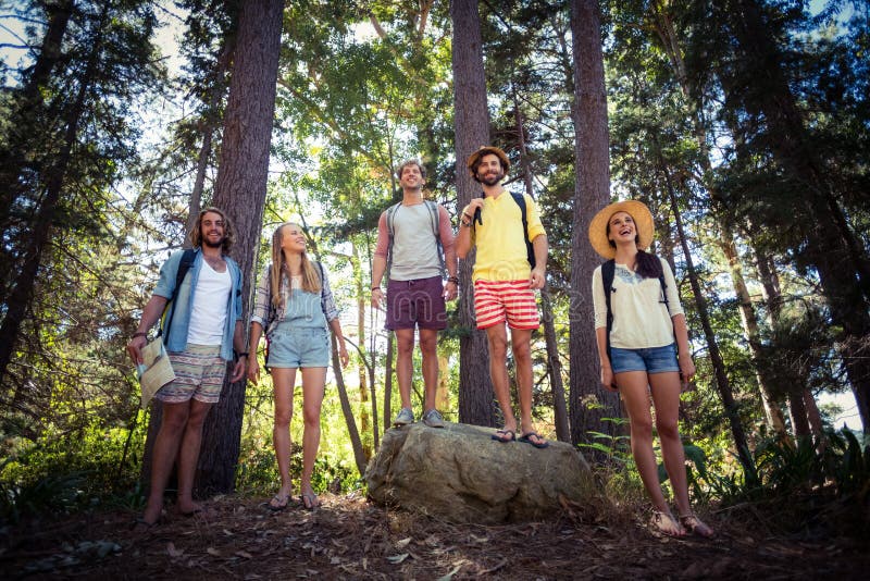 Group of Friends Standing Together in Forest Stock Image - Image of ...