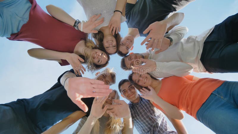 A Group of Friends of Students Look Down and Wave Their Hands. Stock ...