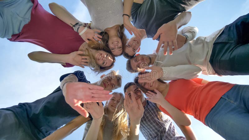 A Group of Friends of Students Look Down and Wave Their Hands. Stock ...