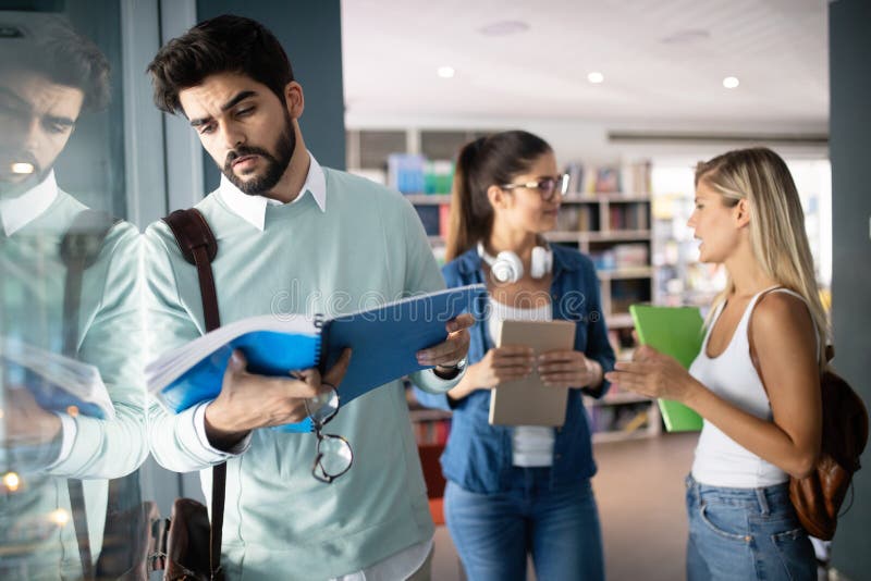 Group of Friends Studying Together at University Campus Stock Image ...
