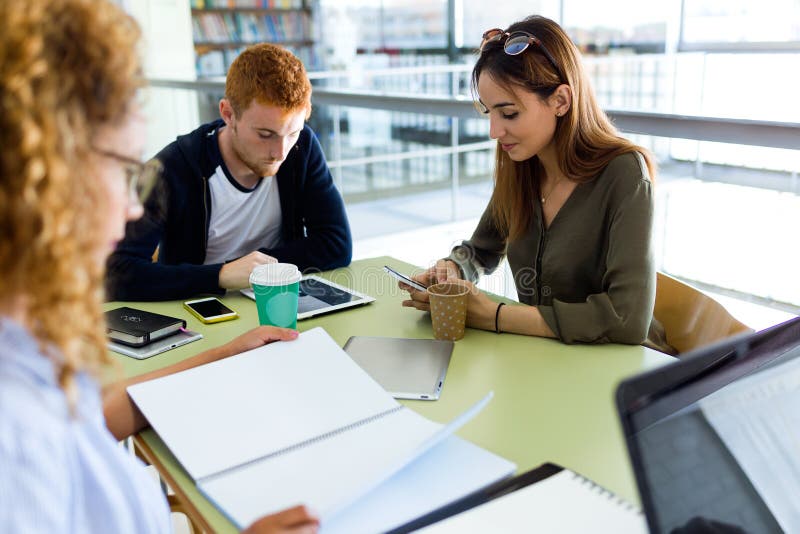 Group of Friends Studying in a University Library. Stock Photo - Image ...