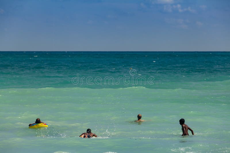 Group of Friends Swimming in the Ocean Stock Photo - Image of ocean ...