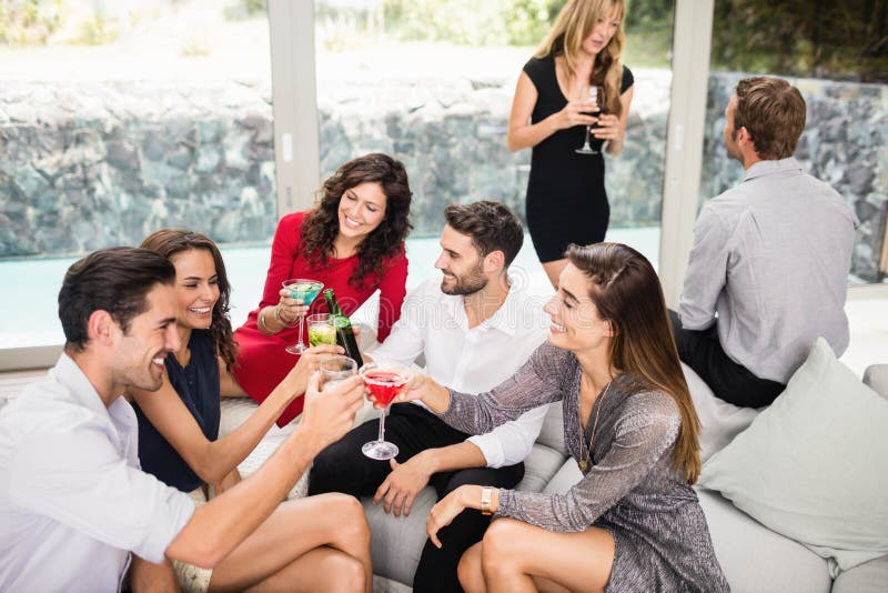 Group of Friends Toasting Cocktail Drinks Stock Image - Image of ...