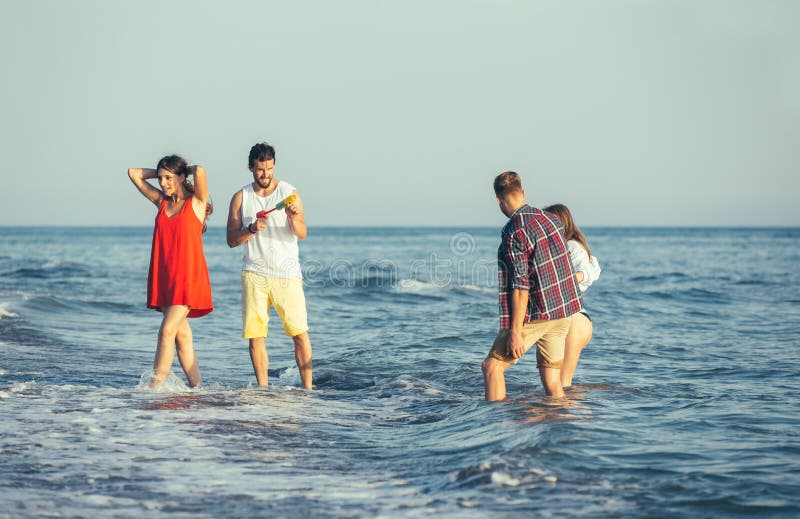 Group of Friends Together on the Beach Stock Photo - Image of outdoors ...