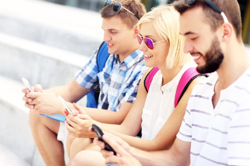 Group of Young Multiracial Friends Using Smartphone Stock Photo - Image ...