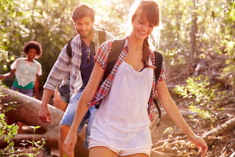 Group of Friends on Walk through Countryside Together Stock Image ...