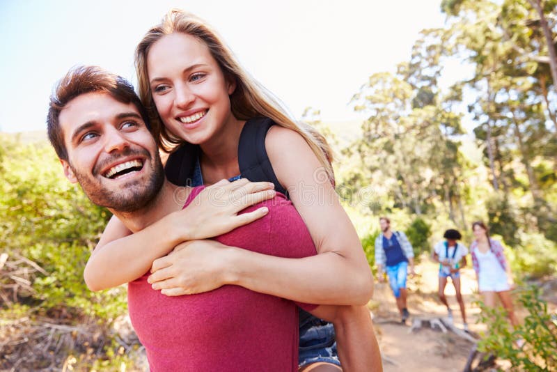 Group of Friends on Walk through Countryside Together Stock Photo ...