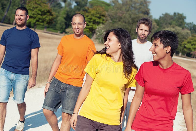 Group of Friends Walking Outside Stock Image - Image of healthy, smile ...