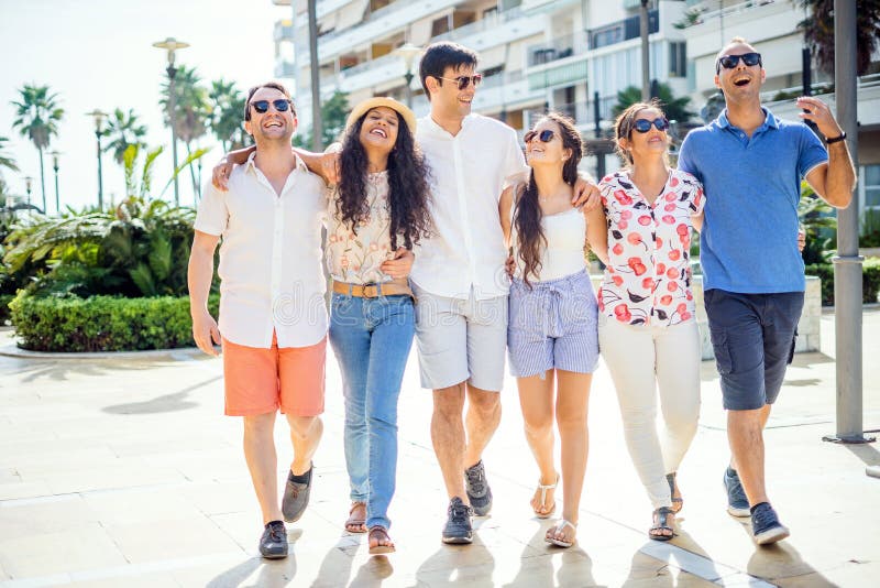 Group of Friends Walking, Taking, Laughing and Having Fun Stock Photo ...