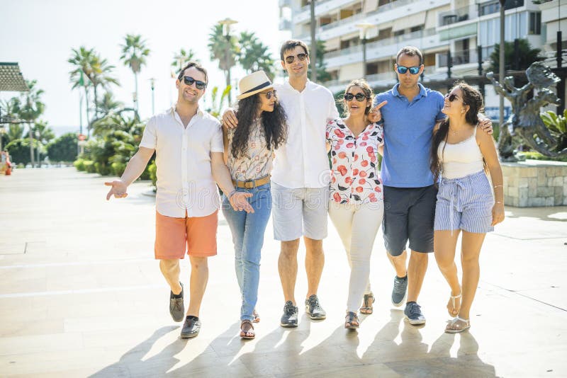 Group of Friends Walking, Taking, Laughing and Having Fun Stock Photo ...