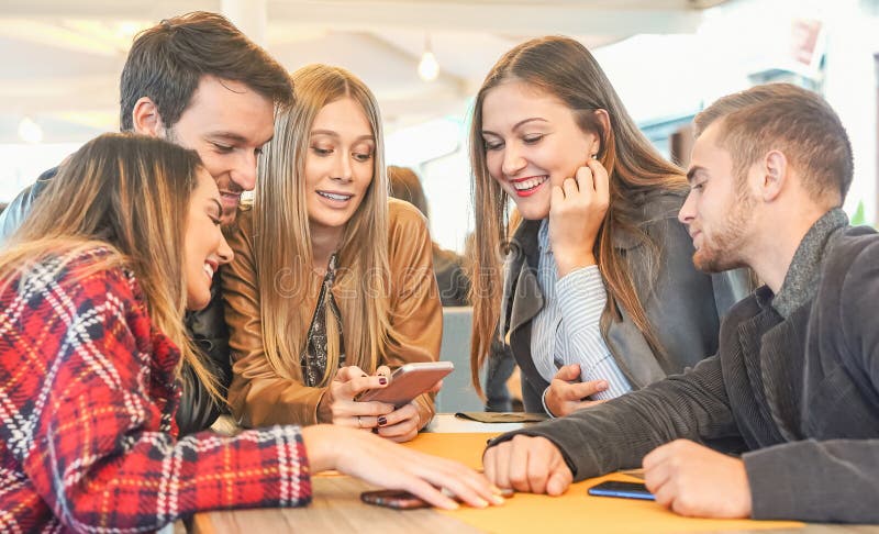 Group of Friends Watching Mobile Phones and Having Fun Stock Image ...