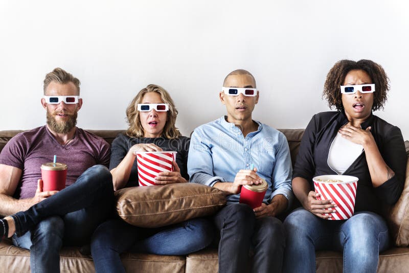 Group of Friends Watching a Movie Together Stock Image - Image of ...