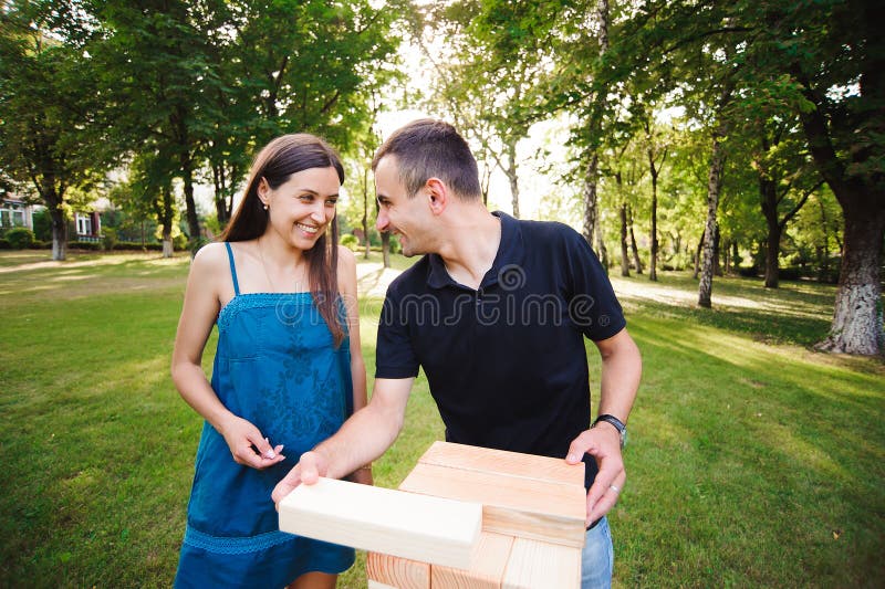 Group Game of Physical Skill with Big Blocks. Stock Photo - Image of ...