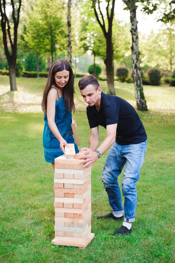 Group Game of Physical Skill with Big Blocks Stock Image - Image of ...