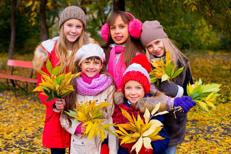 Group of Girls in Autumn Park with Leafs Stock Photo - Image of fashion ...