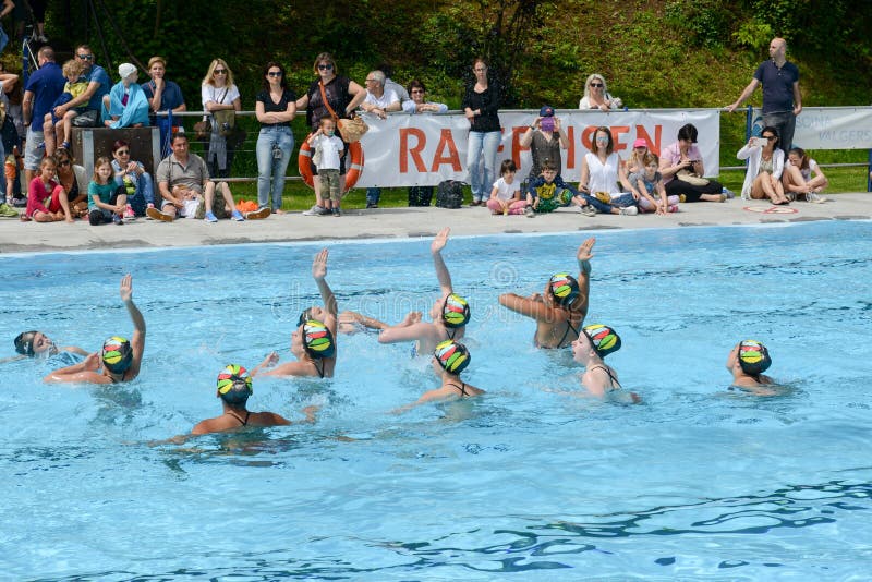 Group of Girls in a Pool Practicing Synchronized Swimming Editorial ...