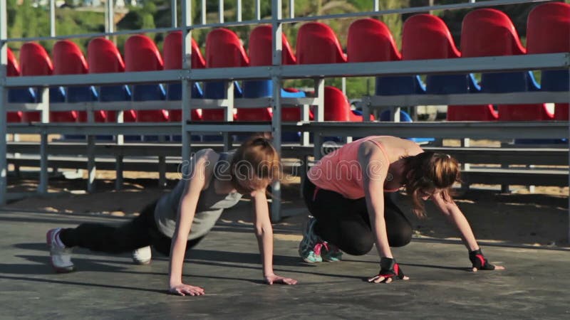 Group of Girls are Practicing the Plank Pose, Stock Footage - Video of ...