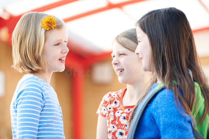 Group of Girls Talking Outside School Building Stock Photo - Image of ...