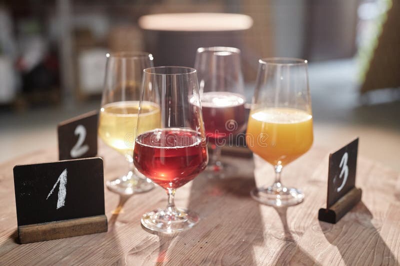 Group of Glasses with Cider Samples Served for Degustation on Pub Table ...