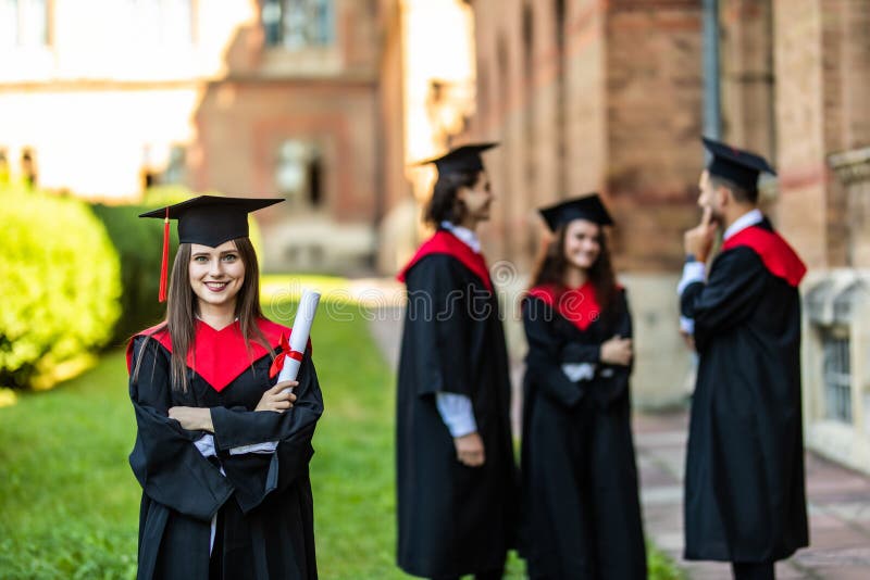 Group of Graduate Students Holding Their Diploma after Graduation at ...