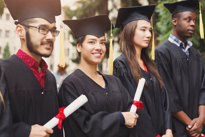 A Group of Graduates Celebrating Stock Image - Image of degree ...