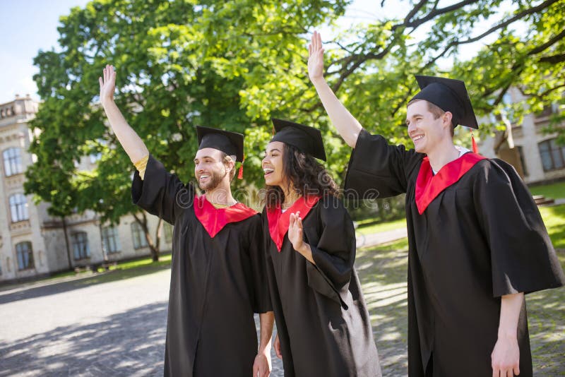 A Group of Graduates in the Park Feeling Great and Excited Stock Photo ...