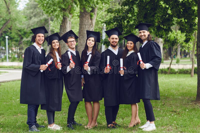 A Group of Graduates Smiling Stock Image - Image of caucasian, concept ...