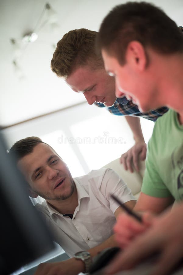 A Group of Graphic Designers at Work Stock Image - Image of development ...