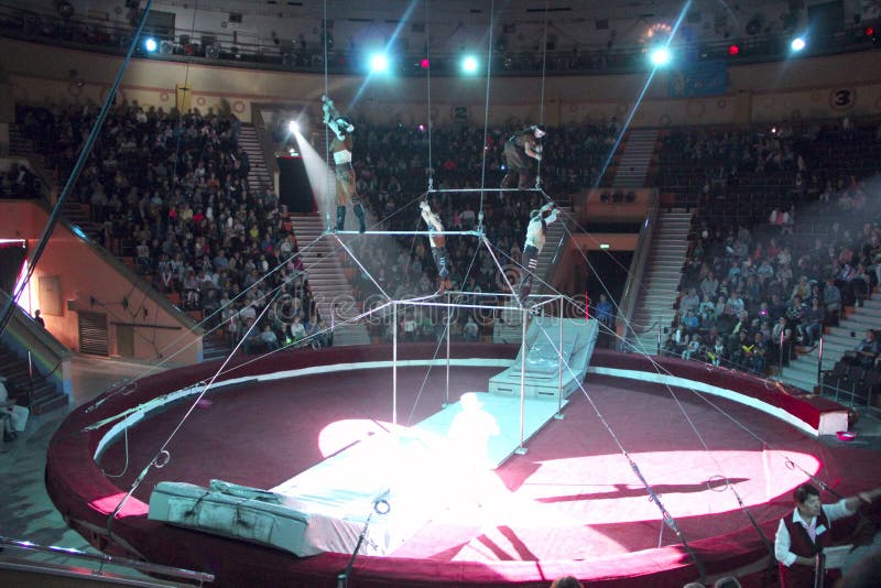 Group of Gymnasts Performing Unimaginable Tricks on Horizontal Bars in ...