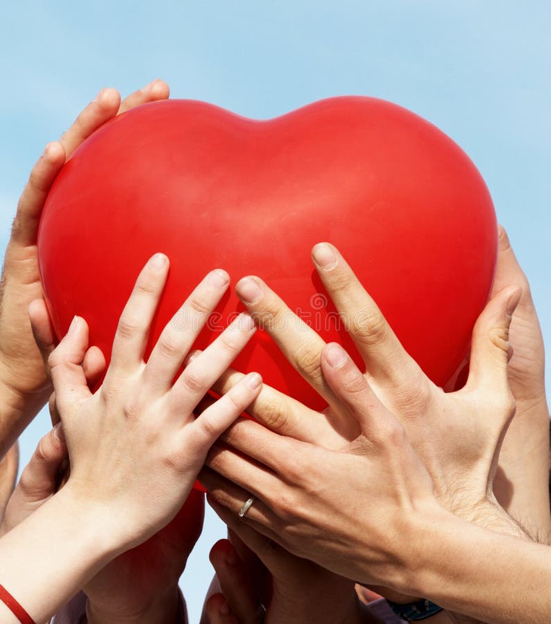Group of Hands Holding Heart Stock Photo - Image of party, hands: 11436226
