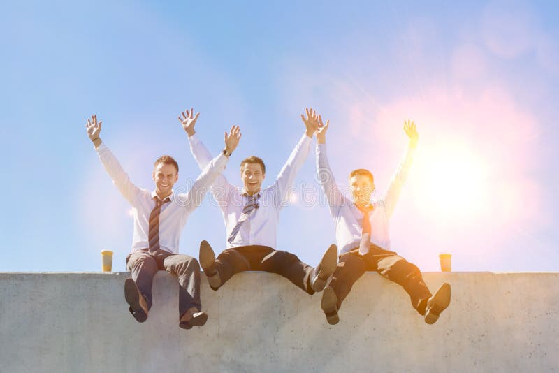 Group of Handsome Businessmen Sitting while Having Fun in Office ...