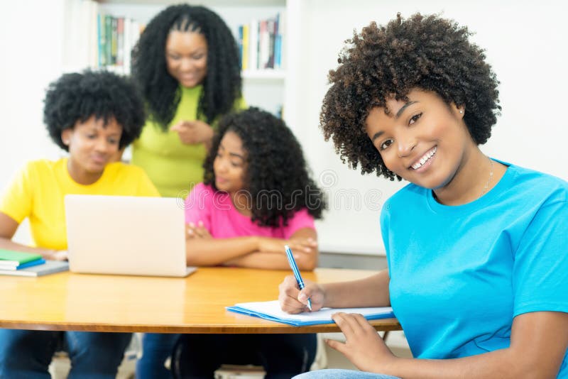 Group of Happy African American Computer Science Students Learning ...