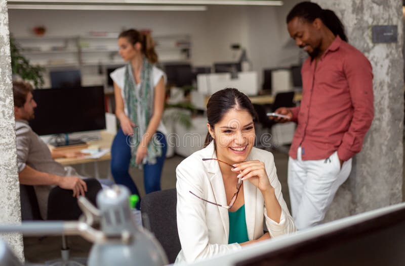 Group of Happy Business People Working As a Team at the Office on ... Group of Happy Business People Working As a Team at the Office on ...