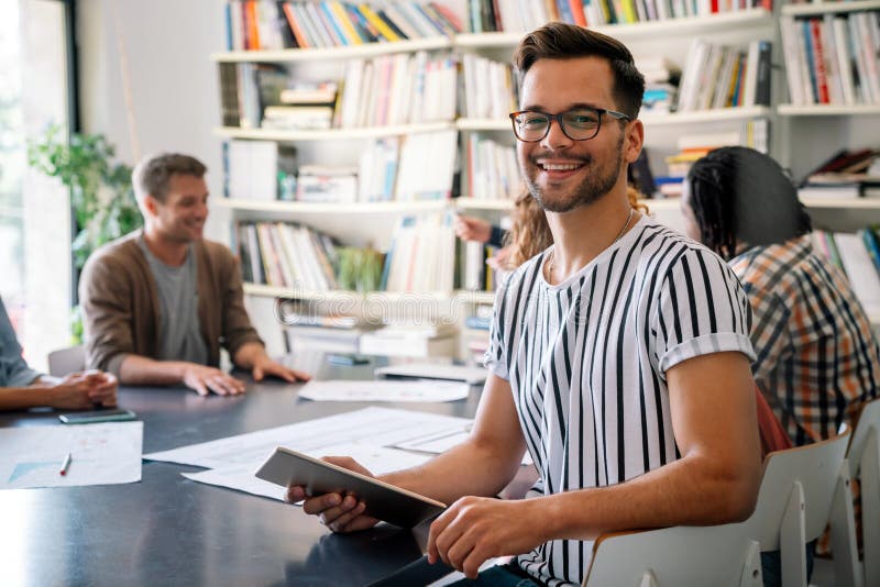 Group of Happy Business People Working Together on Project in Office ... Group of Happy Business People Working Together on Project in Office ...