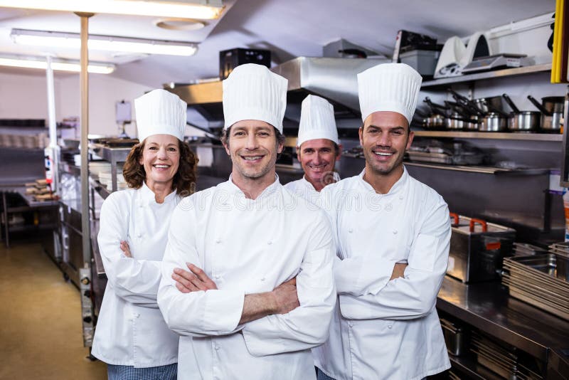 Group of Happy Chefs Smiling at the Camera Stock Photo - Image of ...