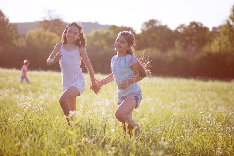 Group of Happy Children Playing Stock Image - Image of field, children ...