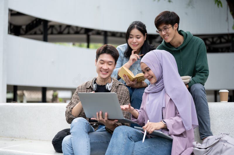 A Group of Diverse Asian Students is Working on a Group Project or ...