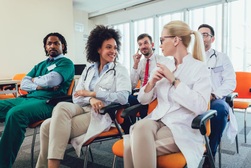 Happy Doctors on Seminar in Lecture Hall at Hospital Stock Photo ...