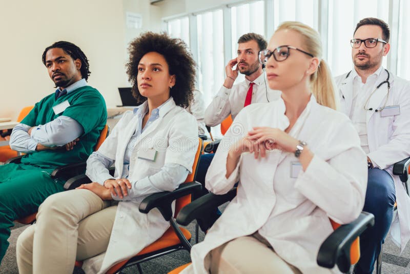 Happy Doctors on Seminar in Lecture Hall at Hospital Stock Image ...