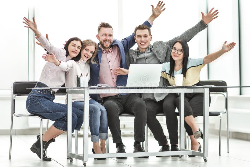Group of Happy Employees Sitting at the Desk. Stock Photo - Image of ... Group of Happy Employees Sitting at the Desk. Stock Photo - Image of ...