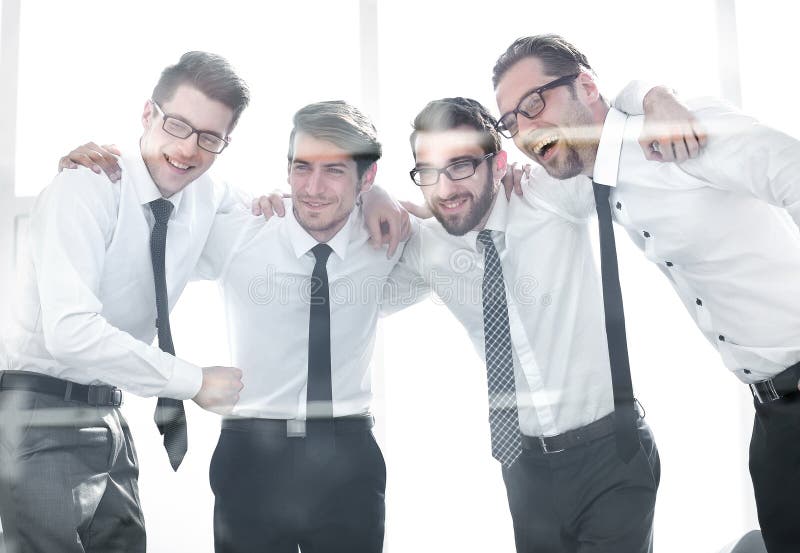 Group of Happy Employees Standing in a Bright Office Stock Image ...