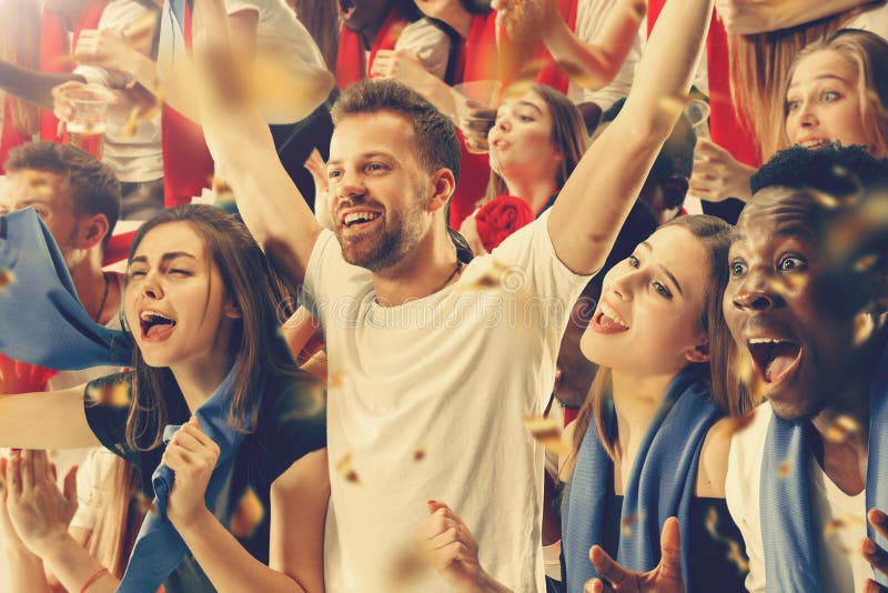 Group of Happy Fans are Cheering for Their Team Victory. Stock Photo ...