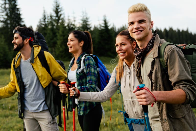 Group of Happy Friends with Backpacks Hiking Together Stock Image ...