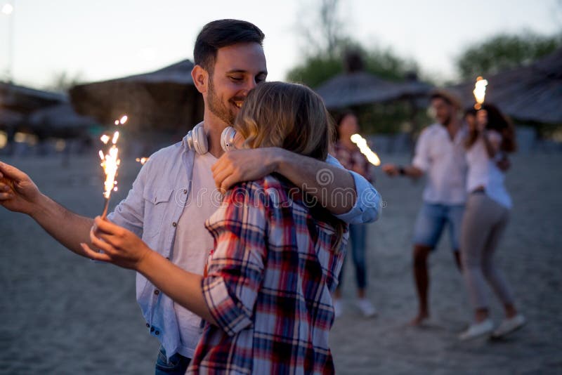 Group of Happy Friends Having Fun on Beach at Night Stock Image - Image ...