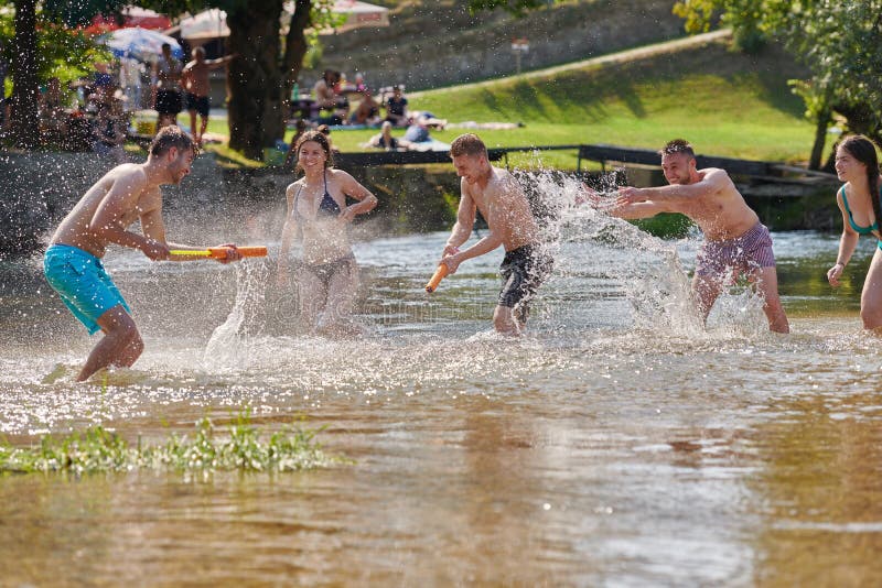Group of Happy Friends Having Fun on River Stock Photo - Image of beach ...